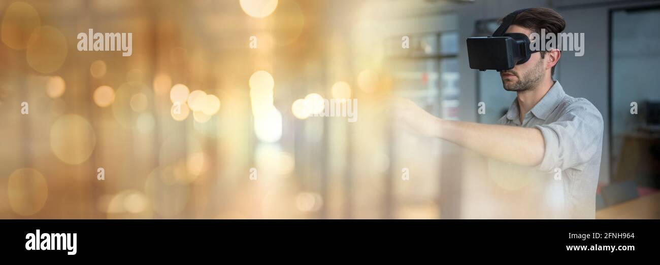 Gold sparkling transition over a man using vr headset, virtual reality ...