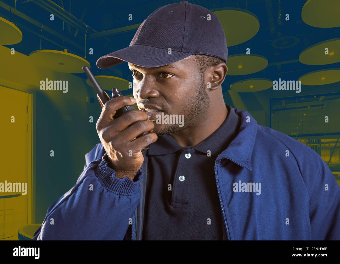 Composition of male security guard using walkie talkie and phone ...