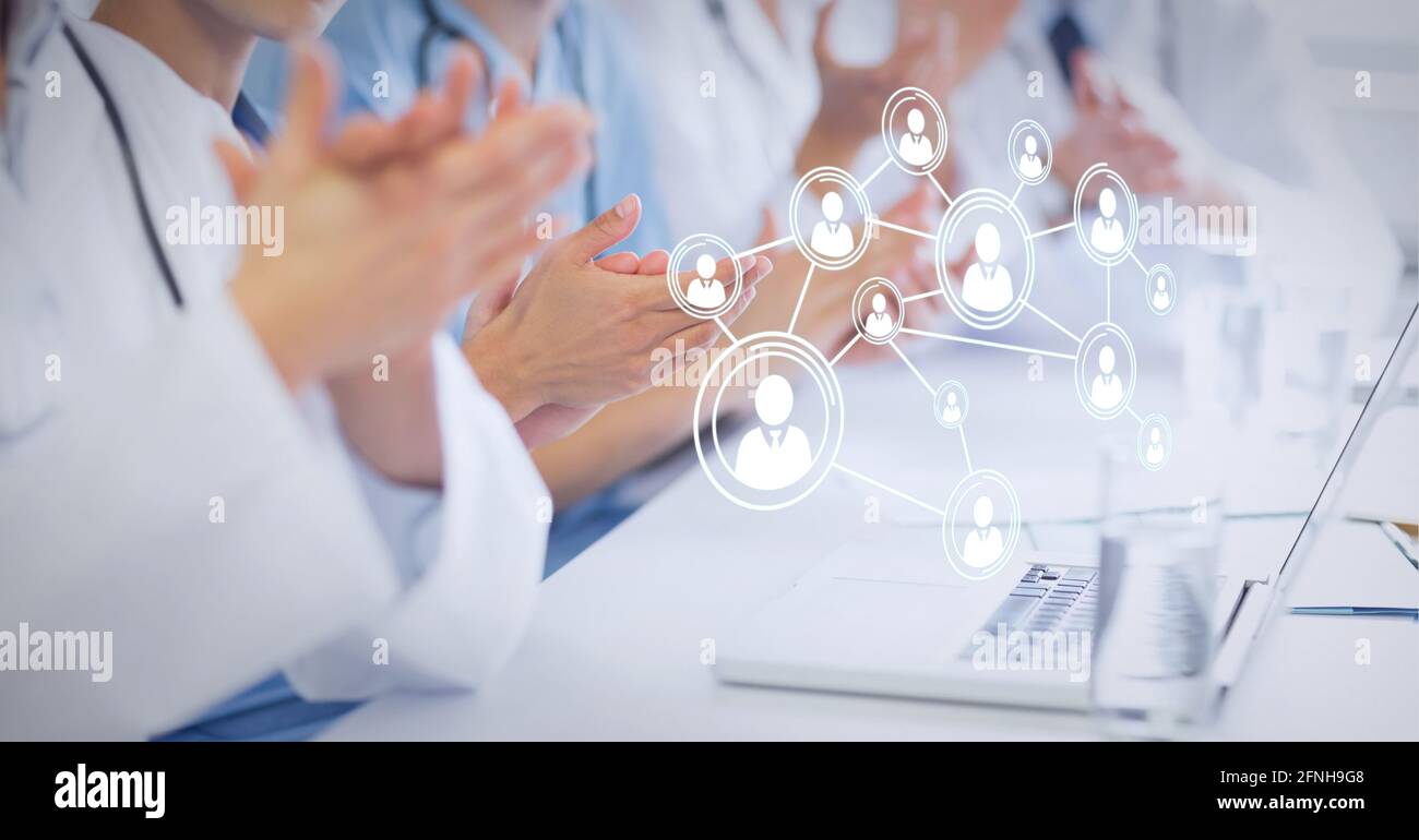 Composition of network of digital people icons over midsection of ...