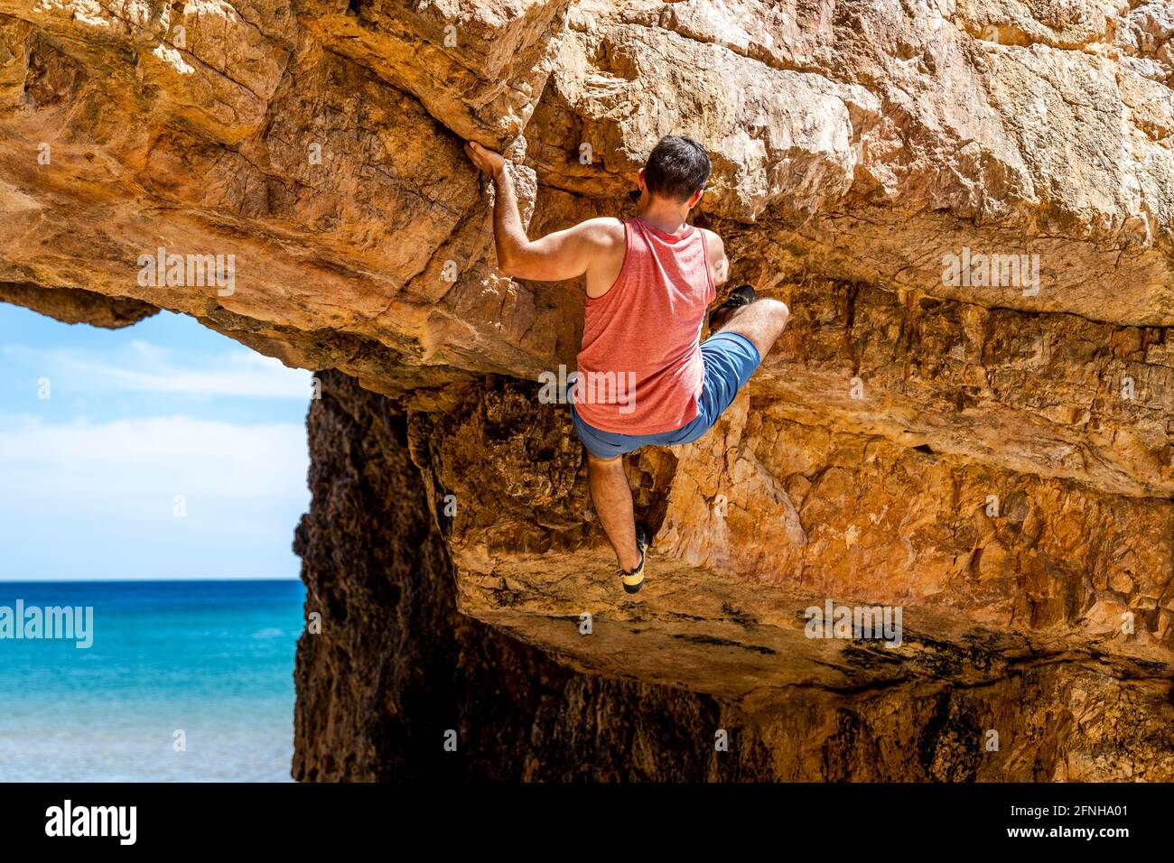 Man climbing window hi-res stock photography and images - Alamy