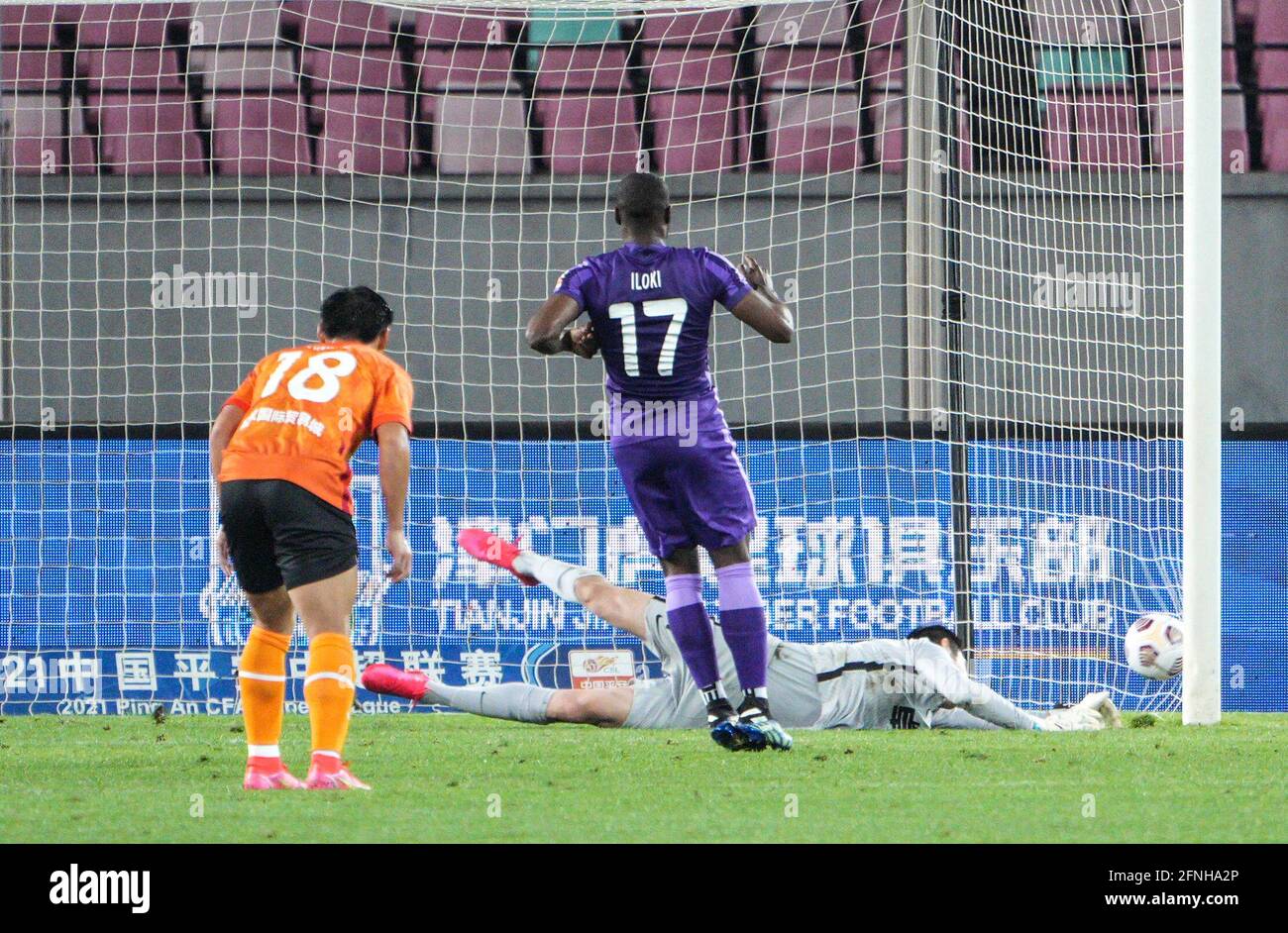 Jiangyin, China's Jiangsu Province. 17th May, 2021. Jules Iloki (top, R ...