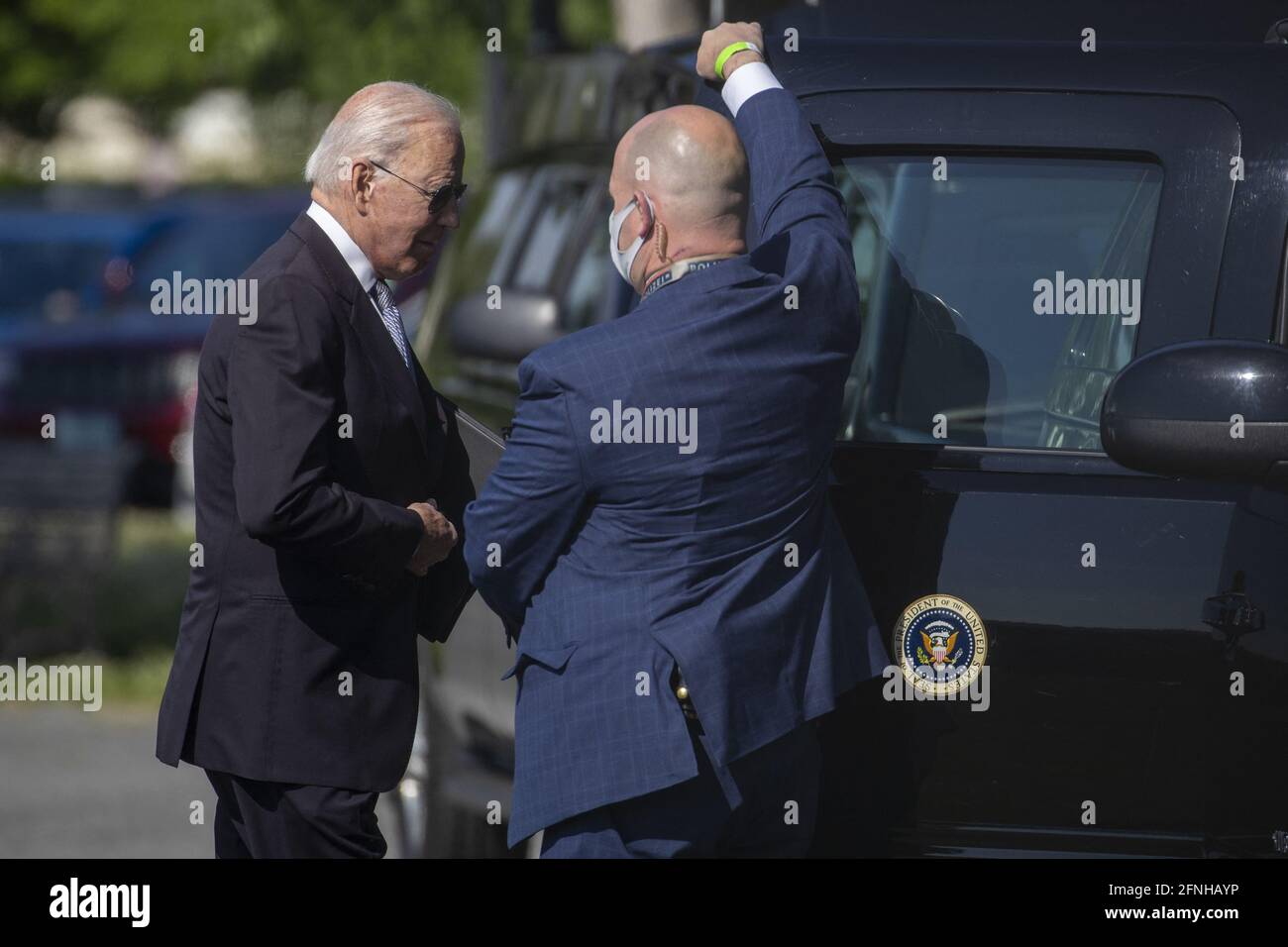 US President Joe Biden steps into a limo following his arrival aboard ...