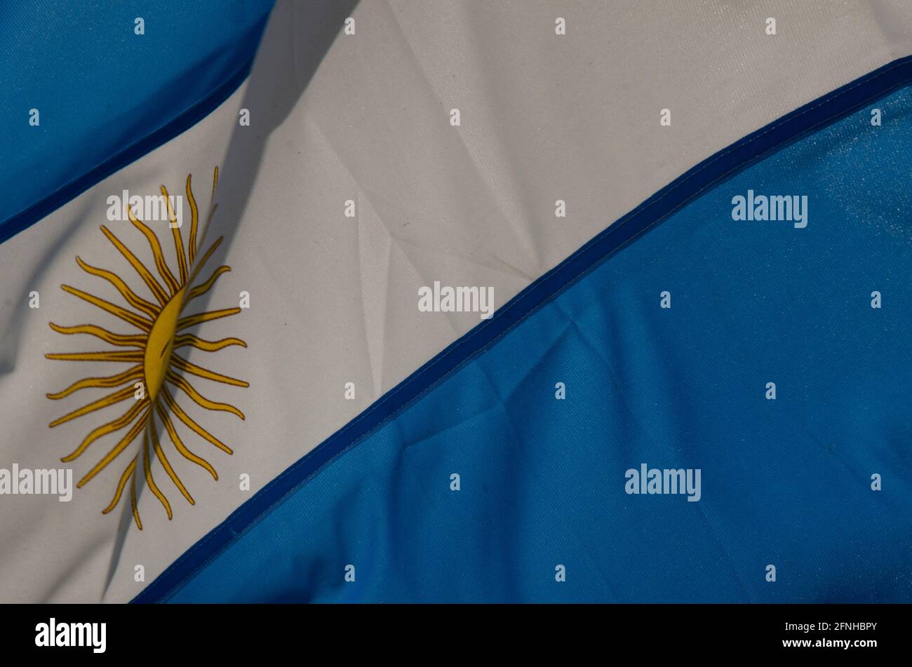 background and texture of fabric of the blue and white flag of the ...
