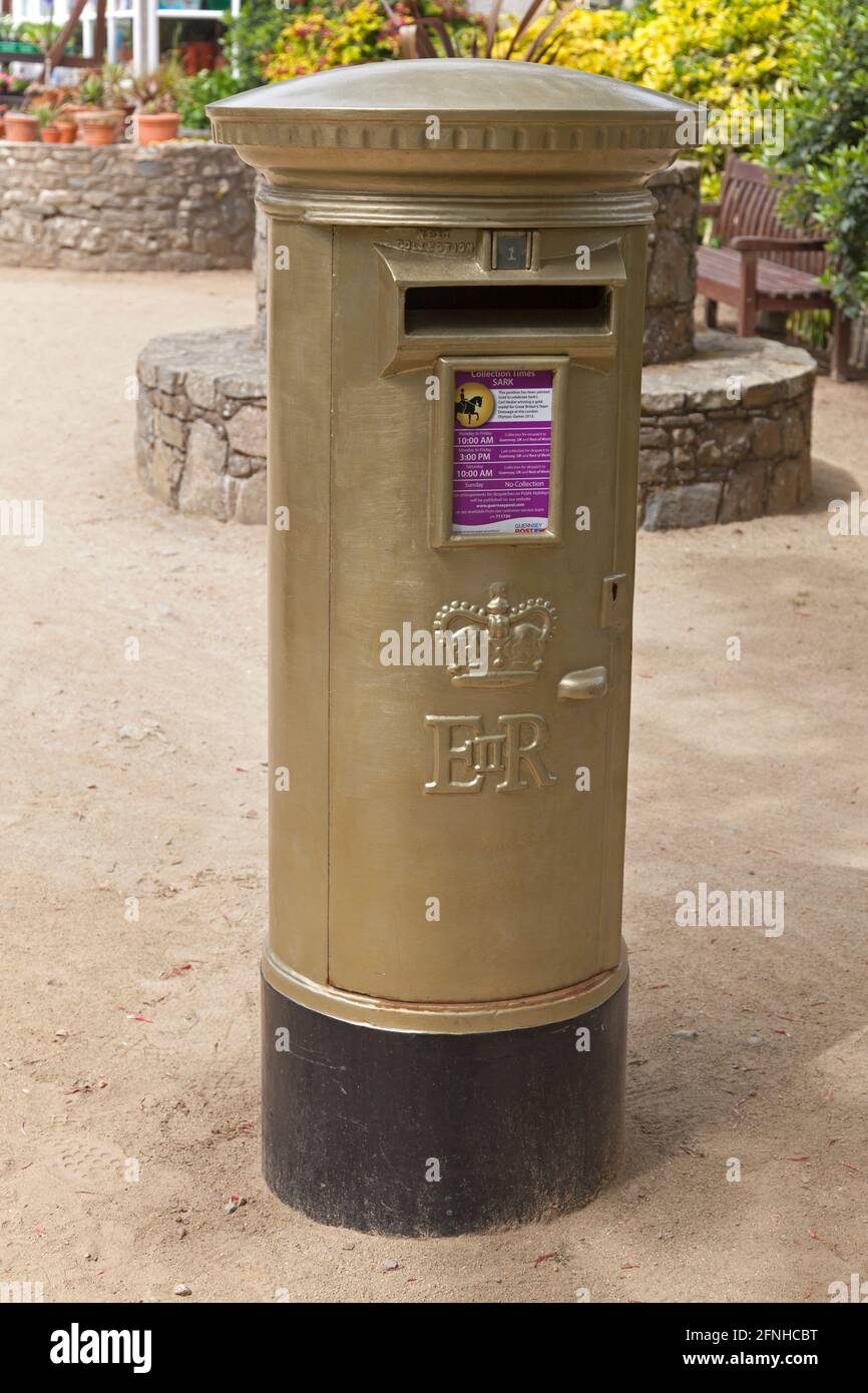 Sark post box painted gold (Normally blue) to celebrate Olympic success ...