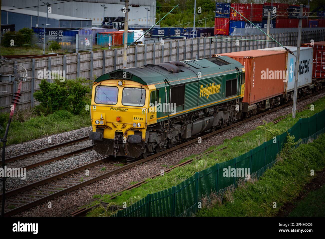 Freightliner Class 66 with load passes DIRFT Stock Photo - Alamy