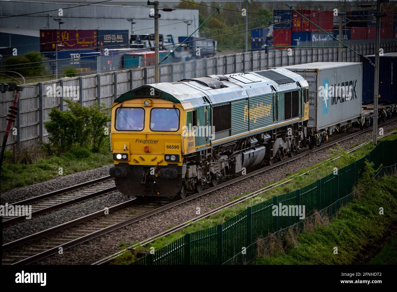 Freightliner Class 66 with load passes DIRFT Stock Photo - Alamy