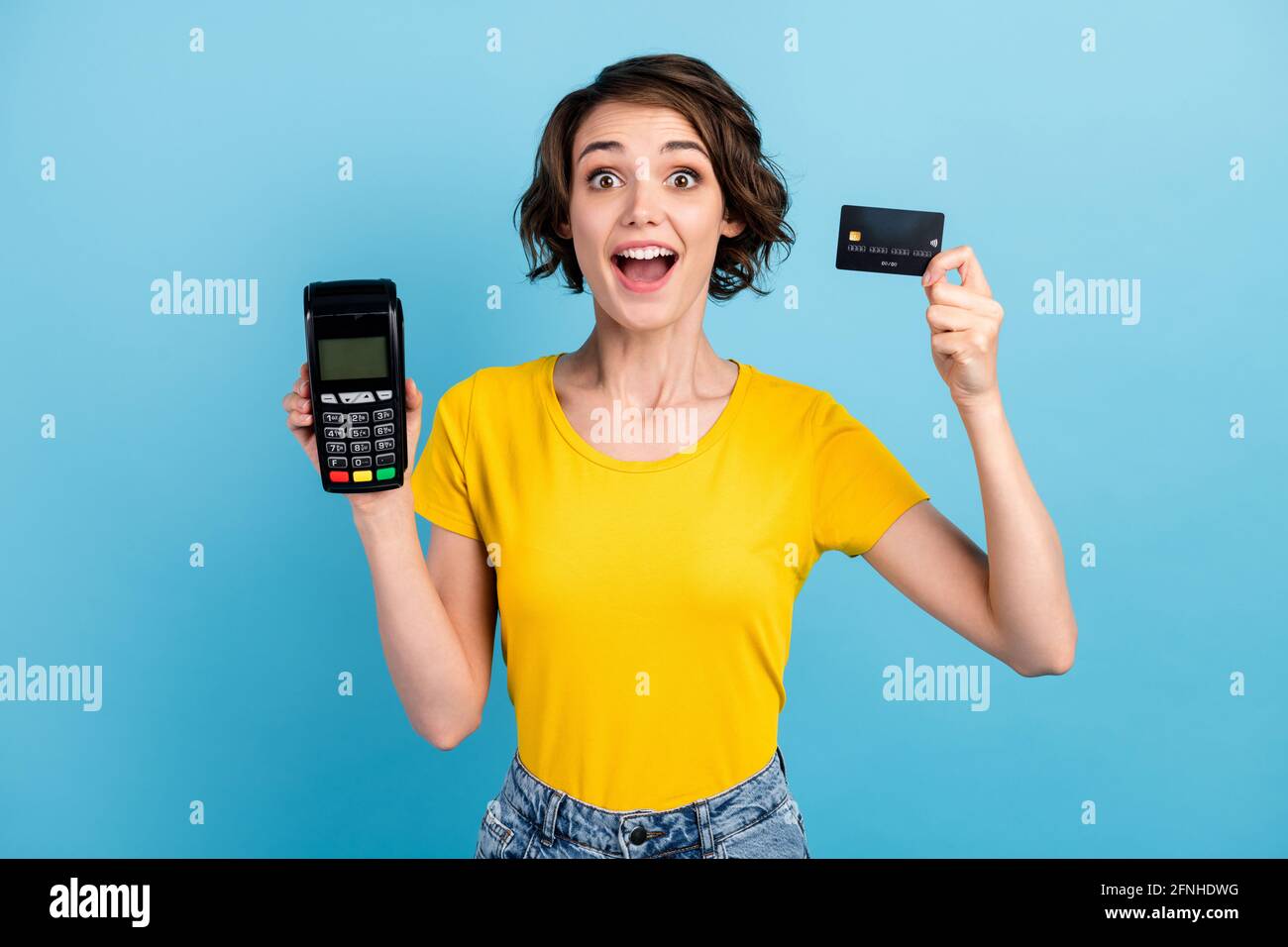 Photo of surprised lady open mouth demonstrate debit card terminal wear ...