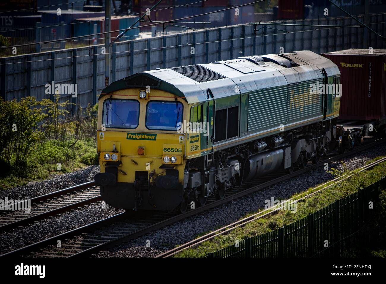 Freightliner Class 66 with load passes DIRFT Stock Photo - Alamy
