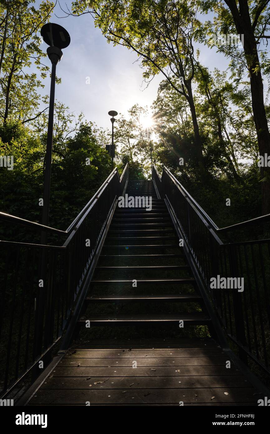 Scenic view of stairs near the river during sunset Stock Photo - Alamy