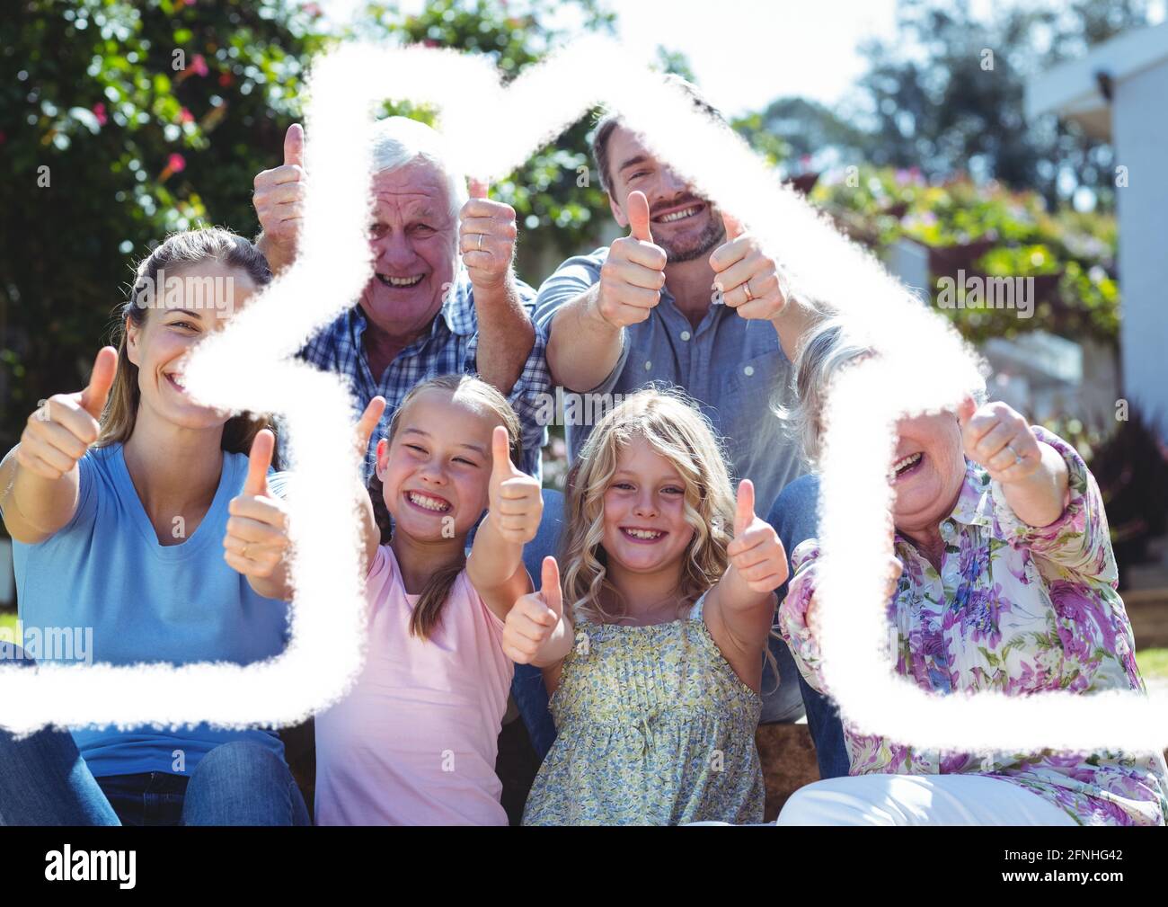 House outline over a happy multigenerational family giving thumbs up ...