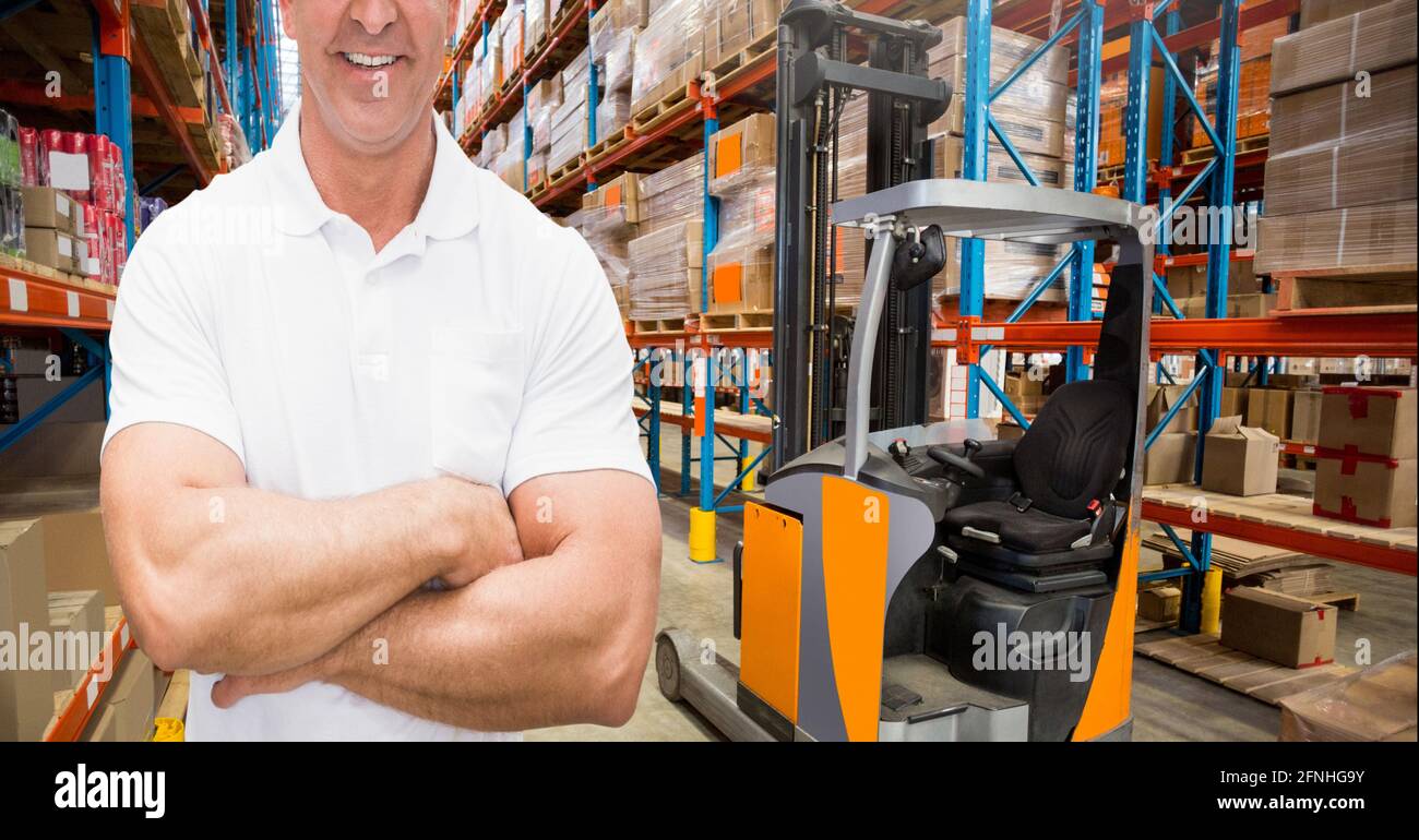 Mid section of caucasian worker arm crossed in an warehouse Stock Photo ...