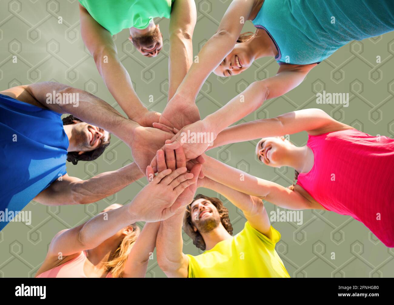 Composition of male and female friends smiling and sacking hands on ...