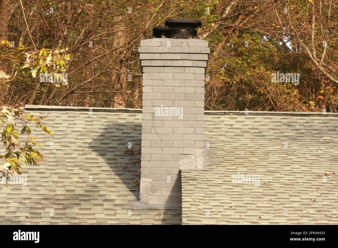 Simple chimney through the roof of a house in the USA Stock Photo - Alamy