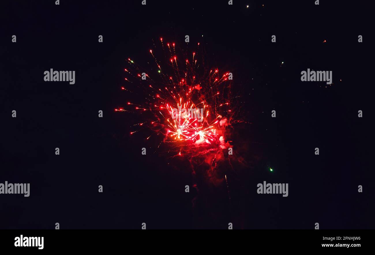 colorful fireworks in the night sky christmas Stock Photo - Alamy