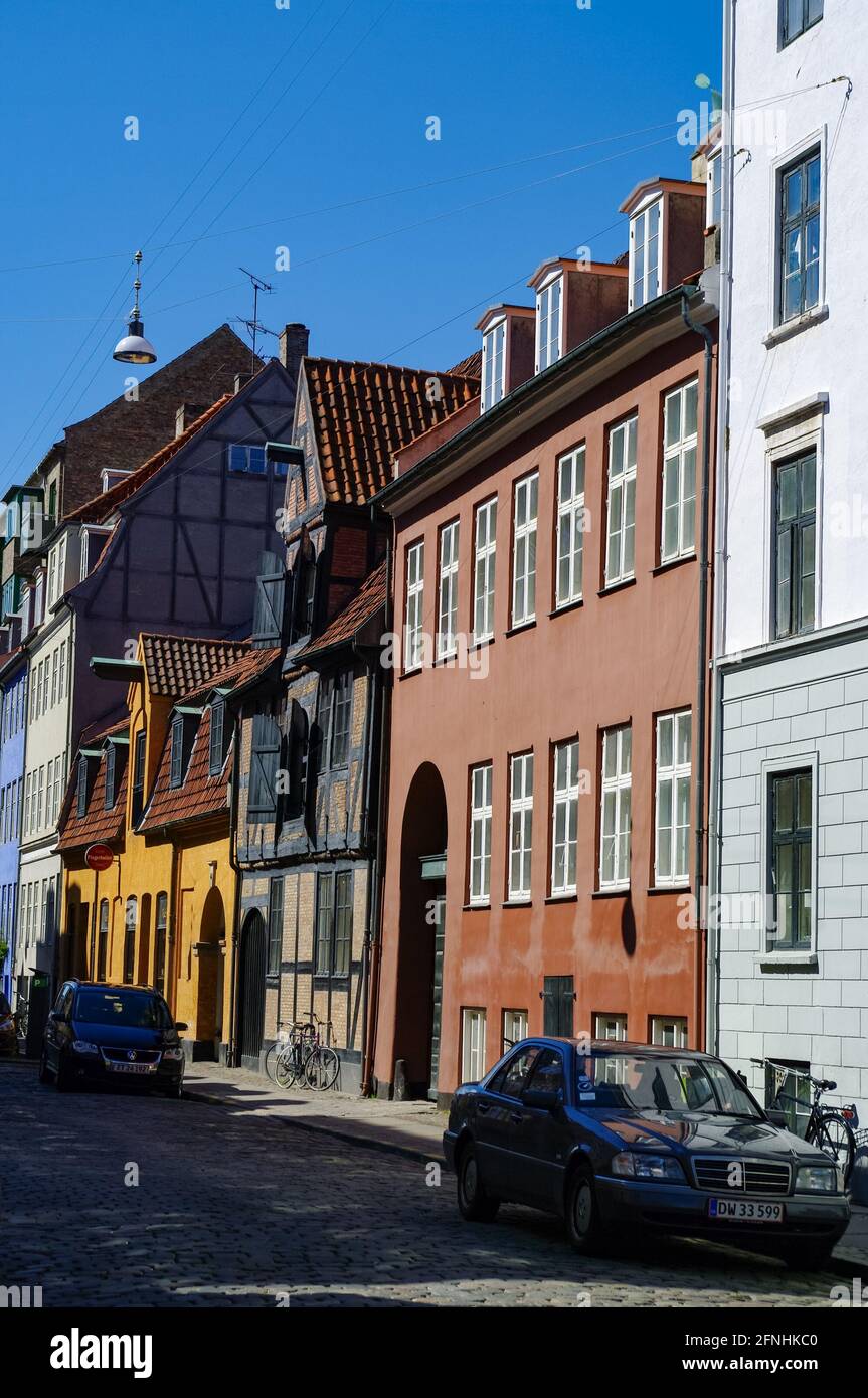 Copenhagen, Denmark - 2 may 2011: Famous narrow street with colourful ...