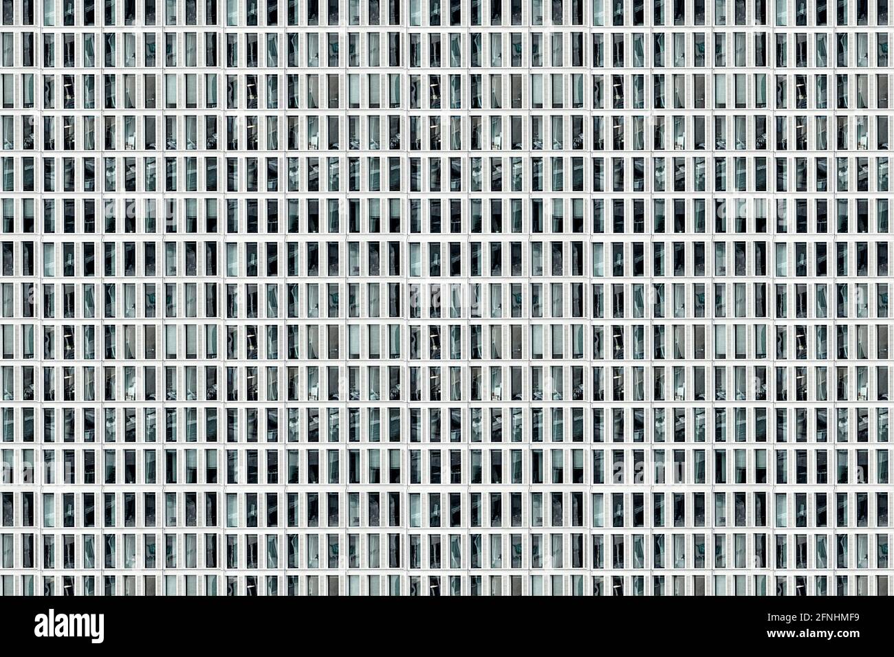 Facade of skyscraper with elongated rectangular windows, abstract ...