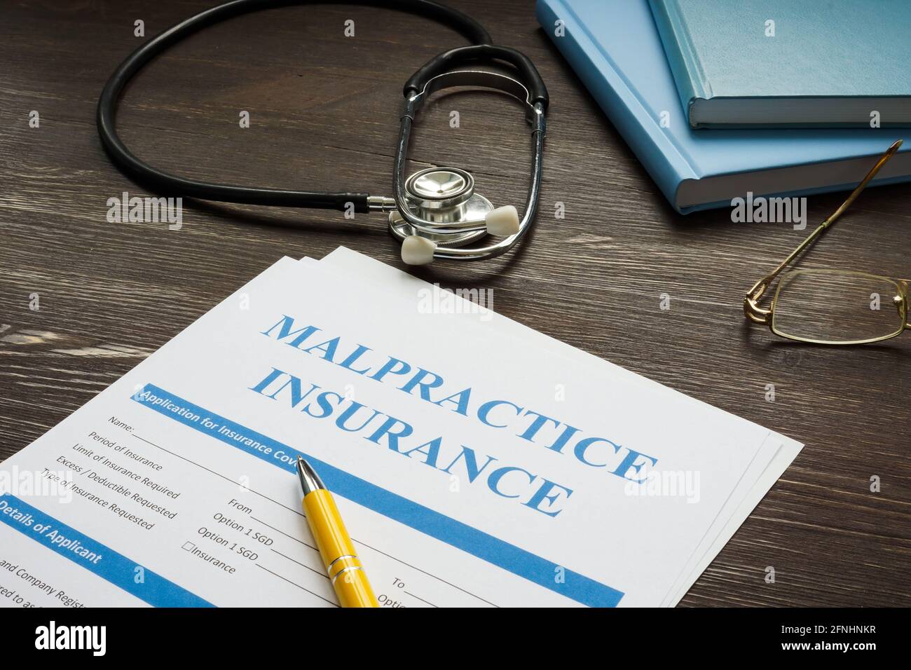 Medical malpractice insurance application with stethoscope Stock Photo ...