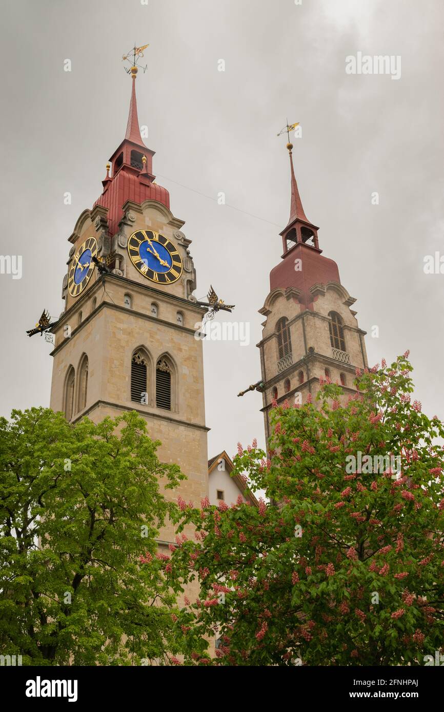Towers of the holy church on a rainy day in the city of Winterthur in ...