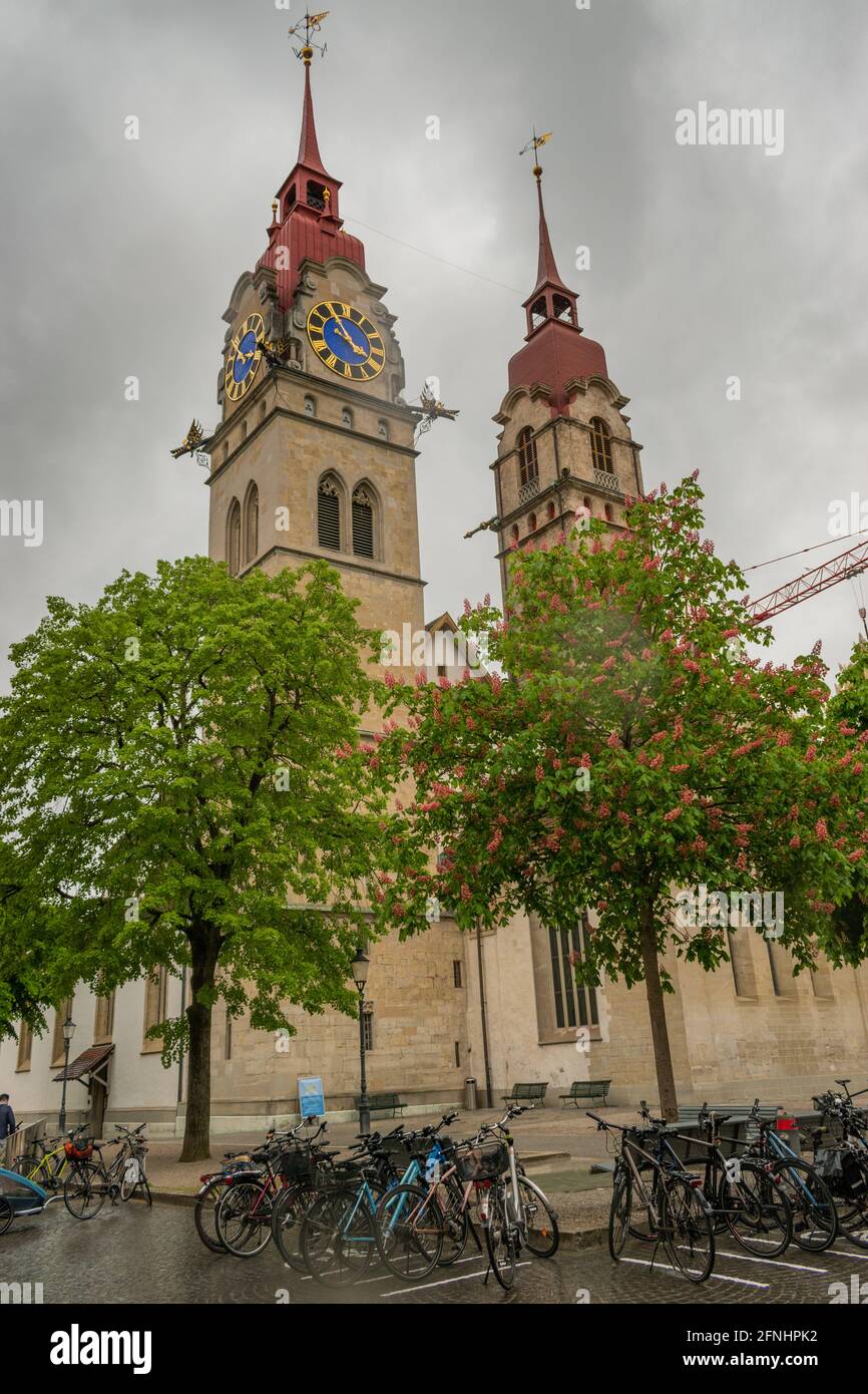 Towers of the holy church on a rainy day in the city of Winterthur in ...