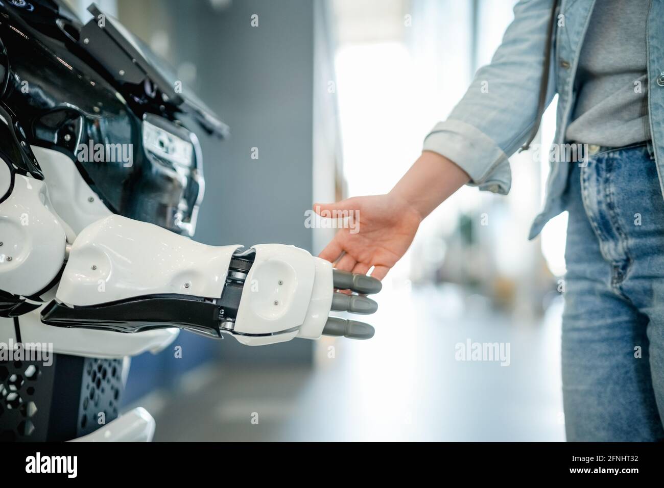 Human robot hand shaking hi-res stock photography and images - Alamy