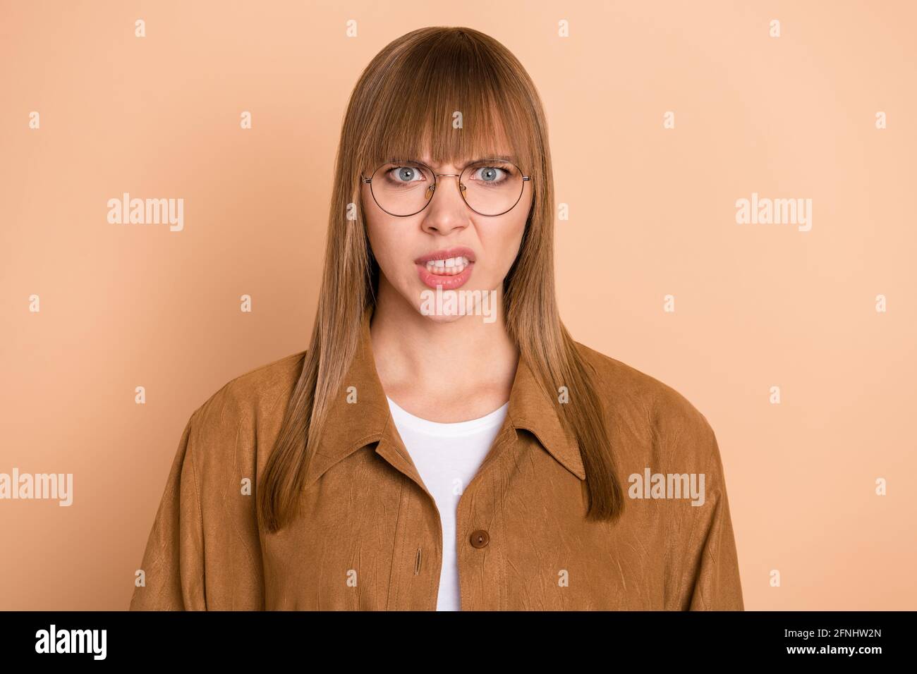 Photo of angry unhappy upset young woman irritated bad mood wear ...