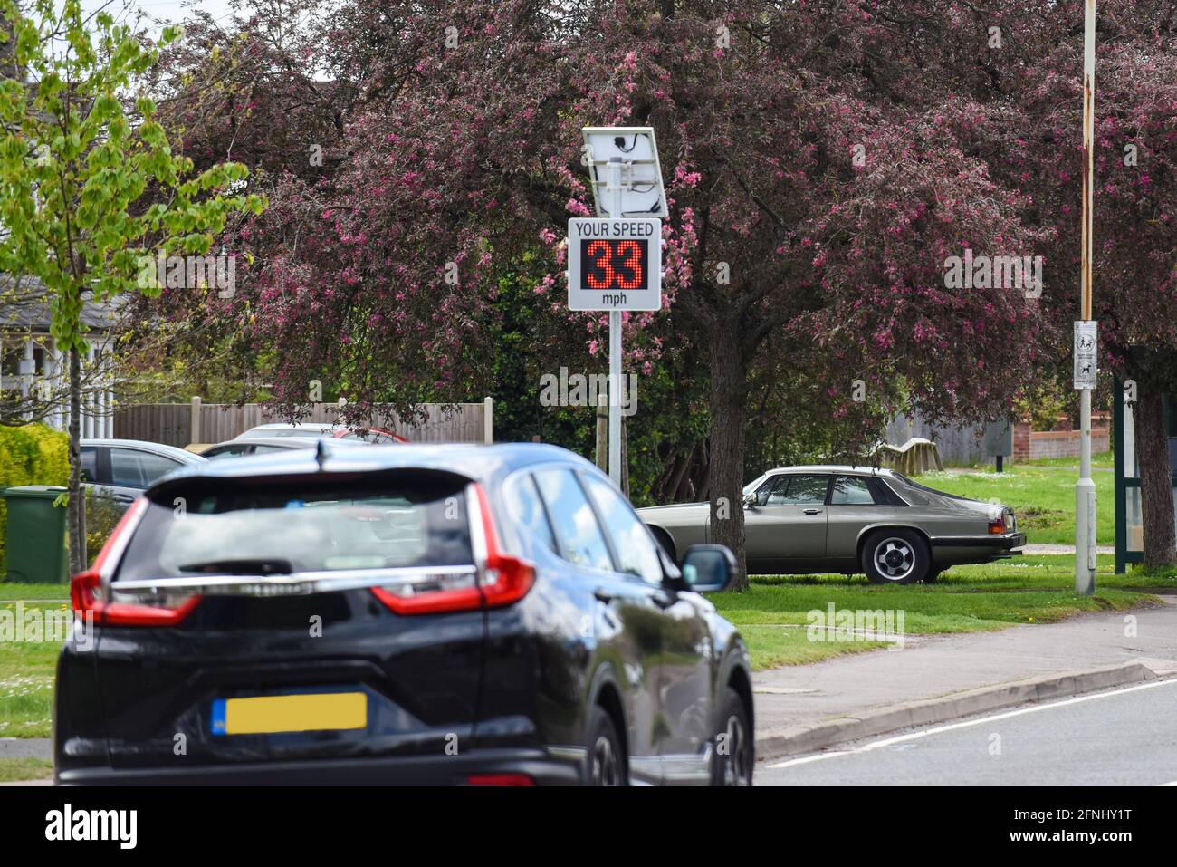 Speed camera warning driver of speeding in residential 30mph limit area ...
