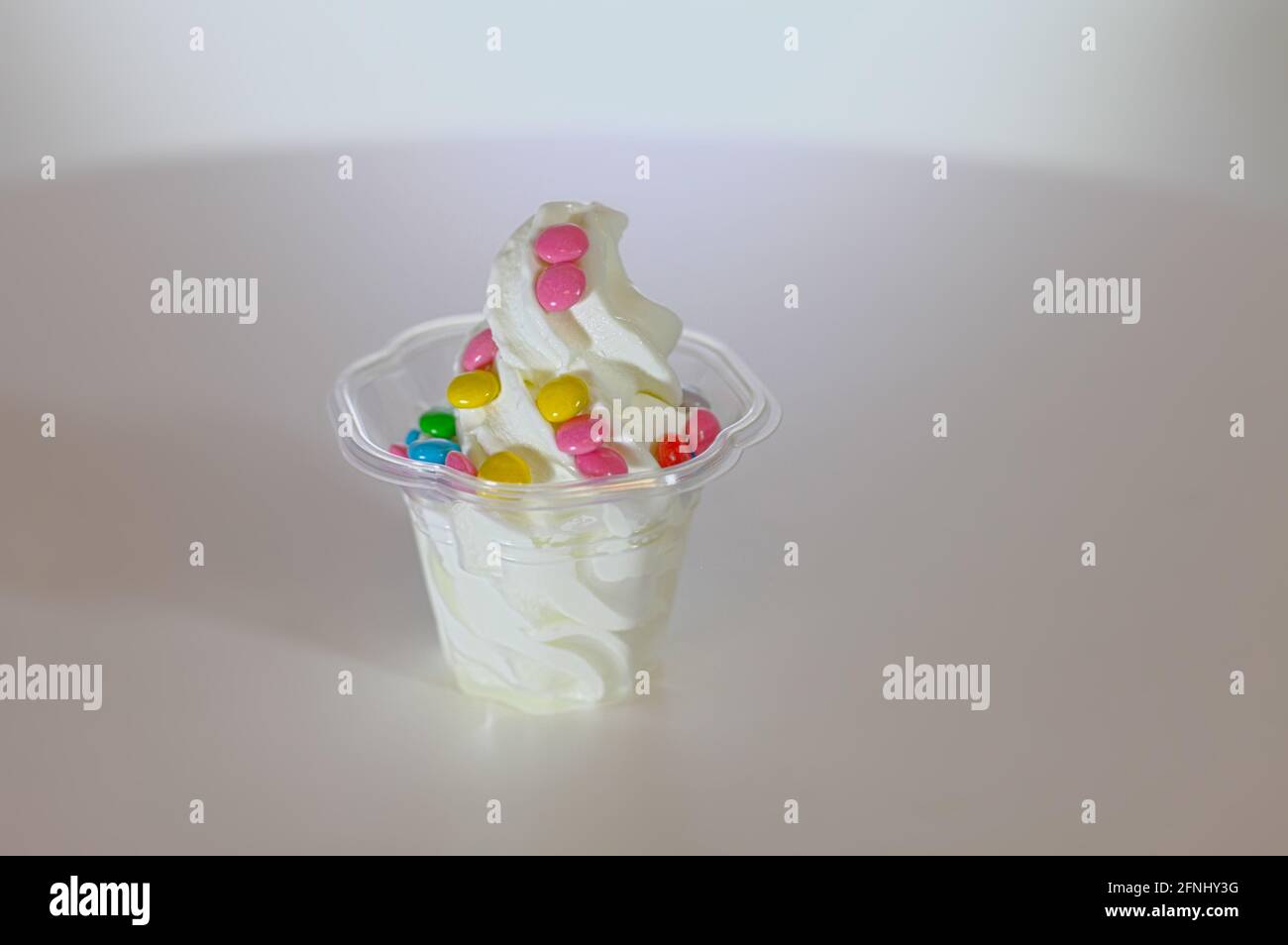 Ice cream and fruit plastic bowl hi-res stock photography and images ...