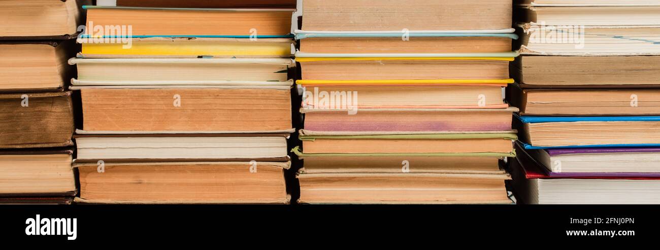 pile of different books in hardcover, banner Stock Photo - Alamy