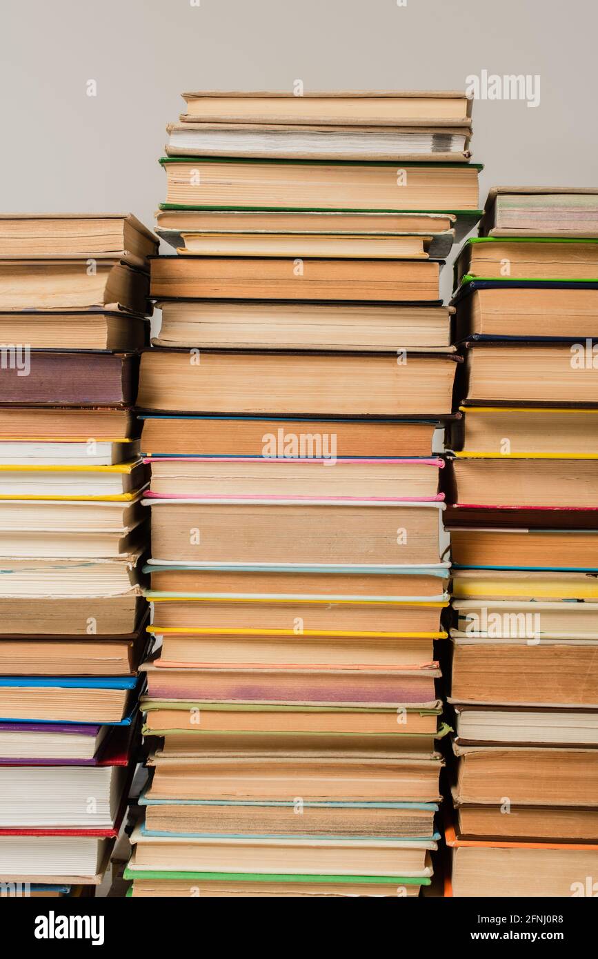 pile of different books in hardcover isolated on white Stock Photo - Alamy