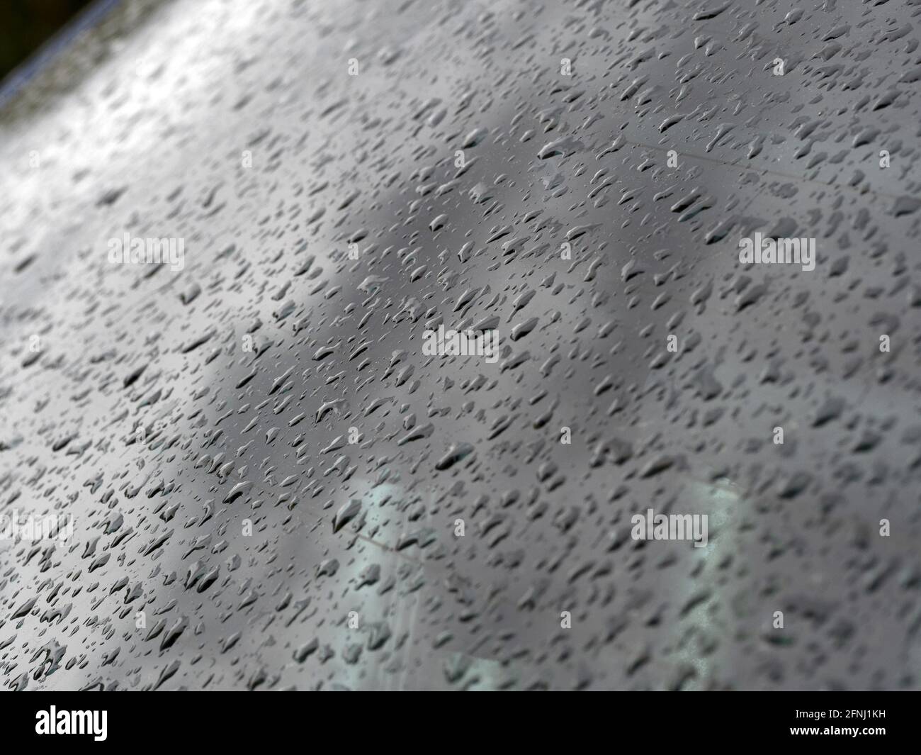 rain water drops on car glass window detail Stock Photo - Alamy