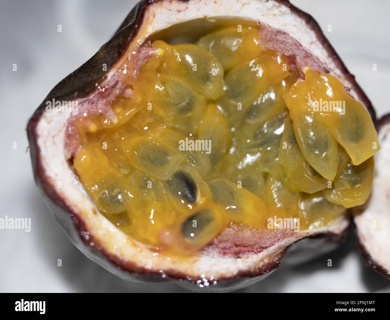 passion fruit seeds close up macro detail Stock Photo - Alamy