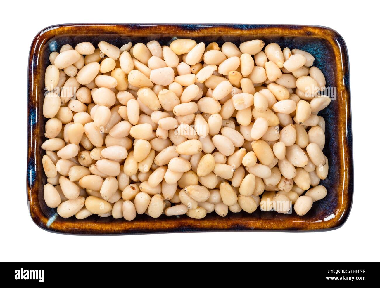 Pinon pine nuts isolated in white hi-res stock photography and images ...