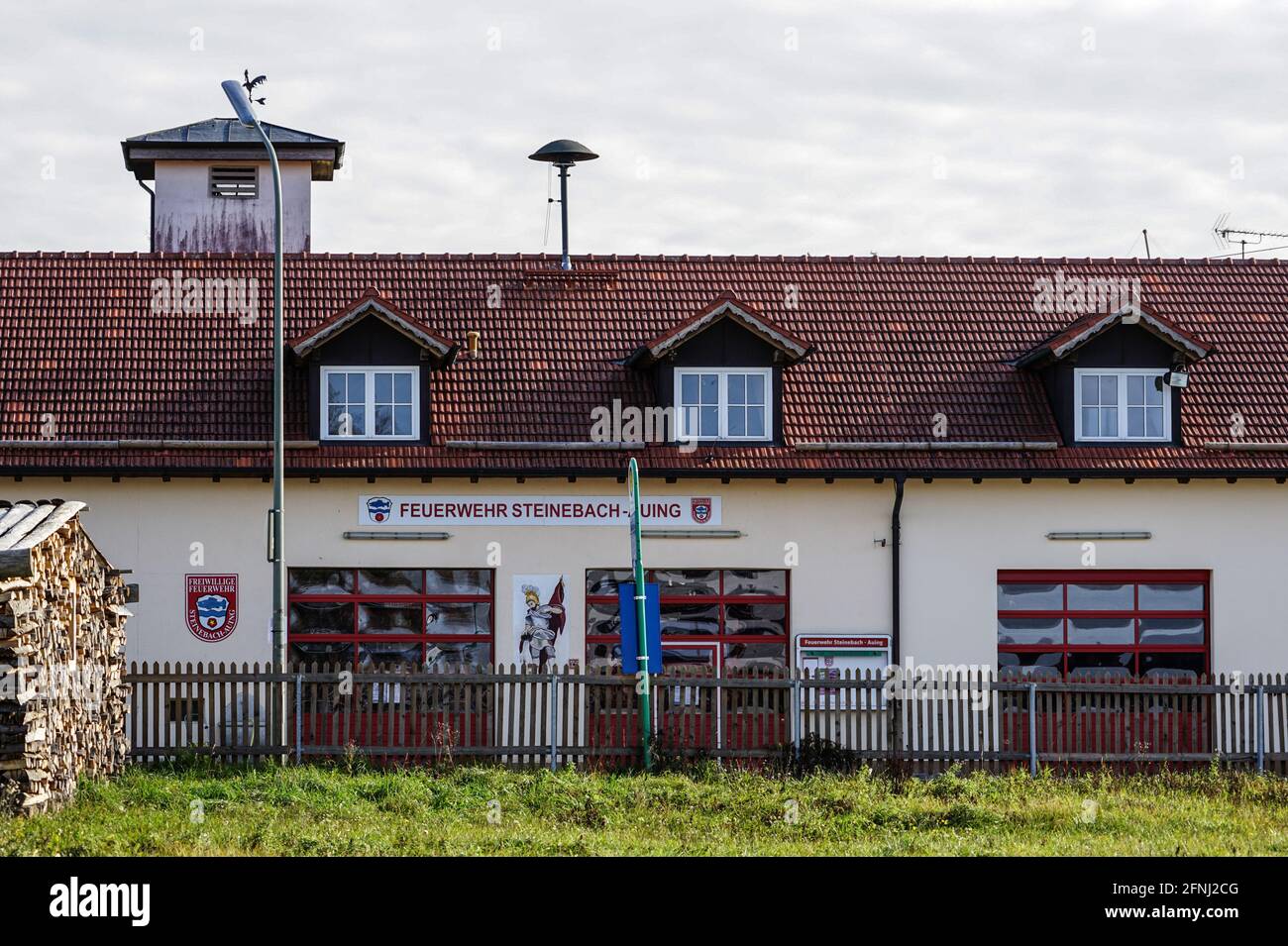 Fire department with firefighters extinguishing house hi-res stock ...