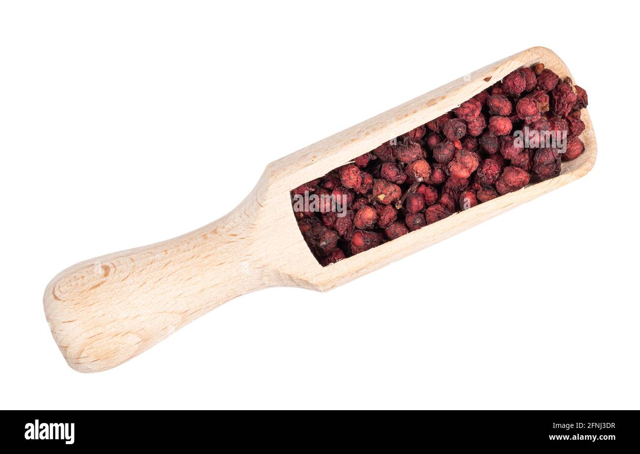 top view of dried magnolia berries (Schisandra Chinensis seeds) in wood ...