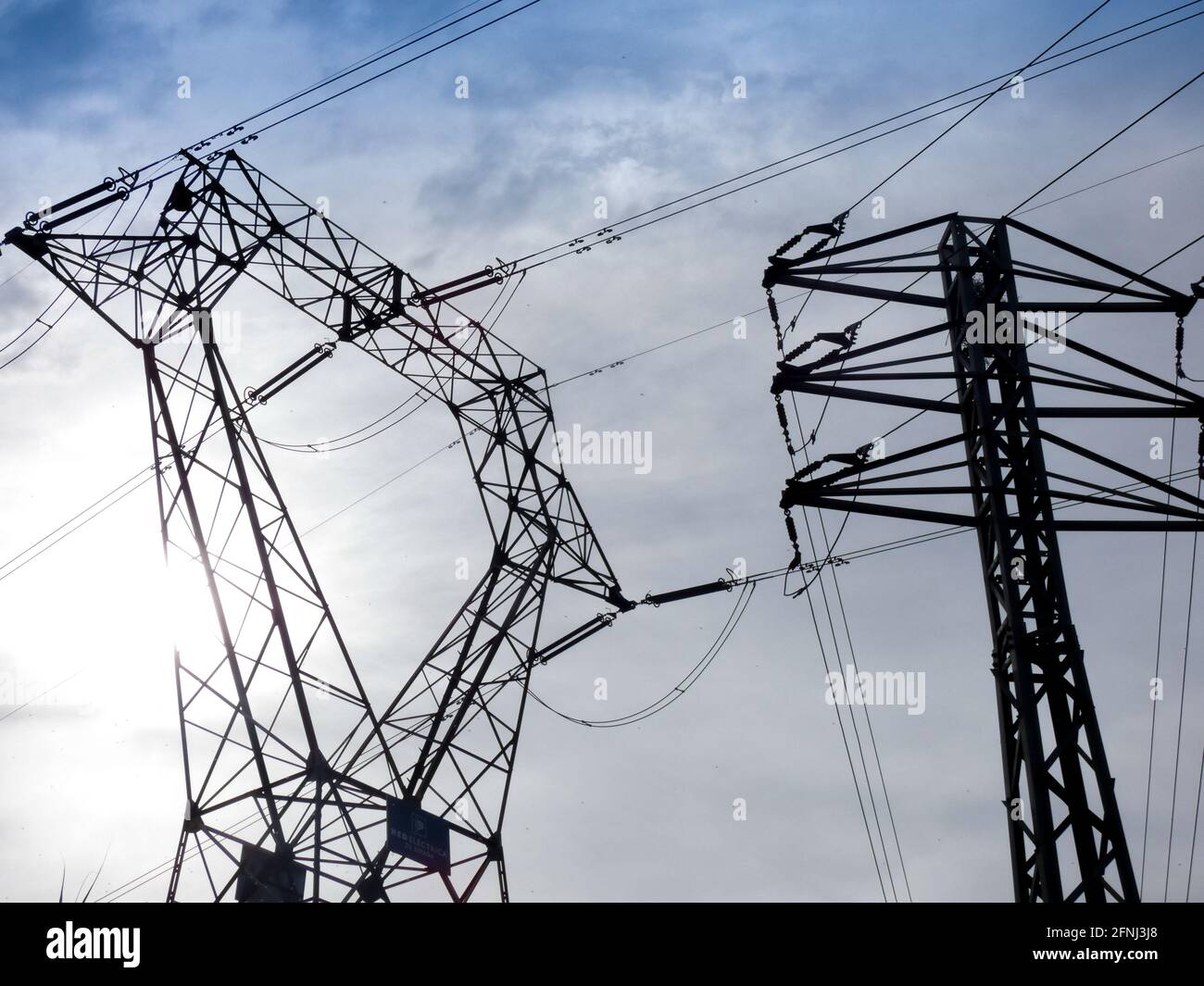 Engineered metal towers to transport electrical energy to different ...