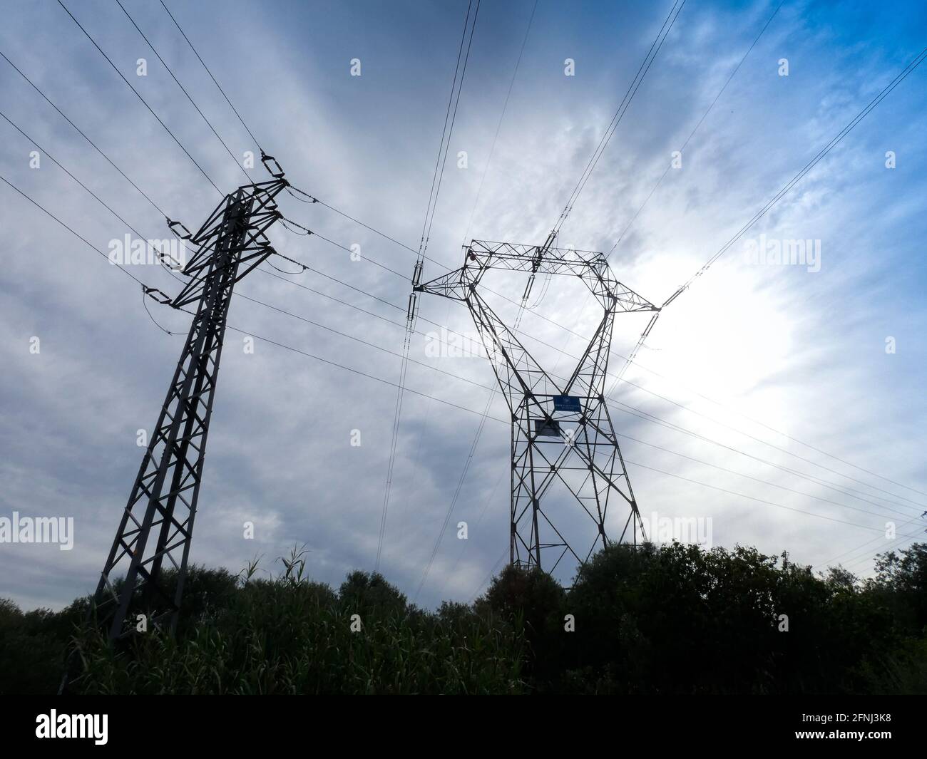 Engineered metal towers to transport electrical energy to different ...