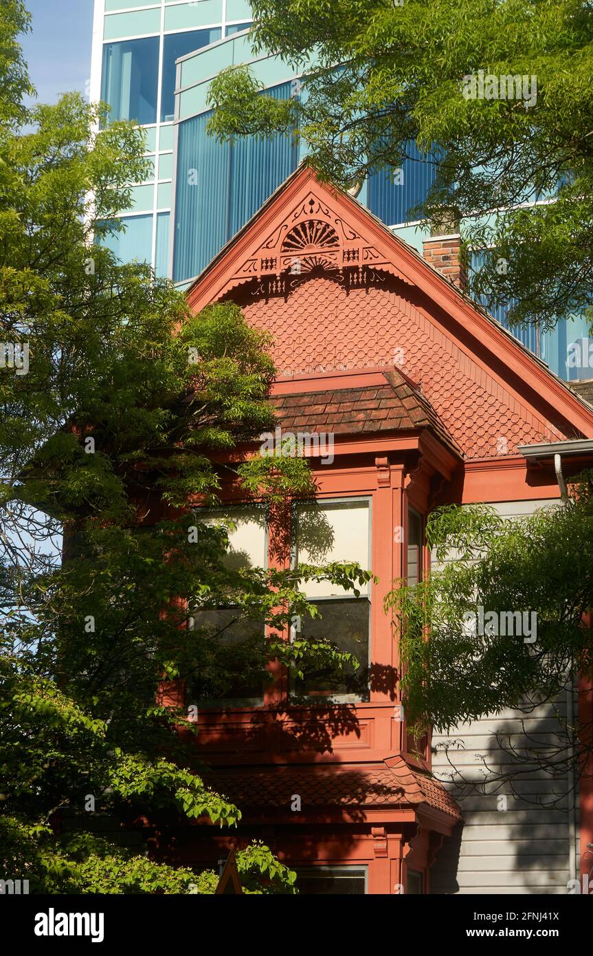Restored Victorian house with modern office building in back, Vancouver ...