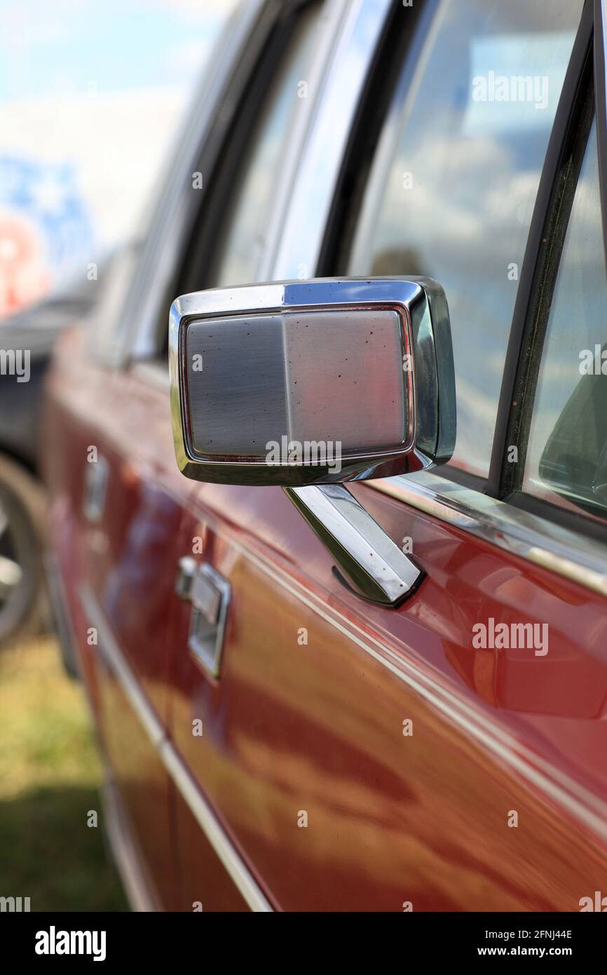 It is rear view mirror of retro red car Stock Photo - Alamy