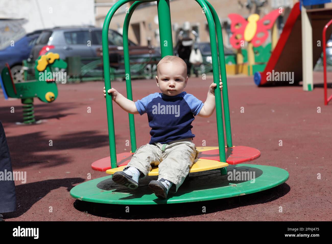Recreational playground roundabout hi-res stock photography and images ...