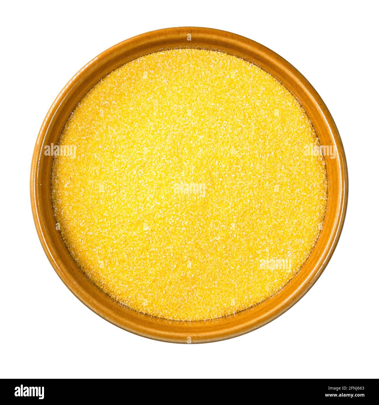 top view of fine ground cornmeal in round bowl cutout on white ...