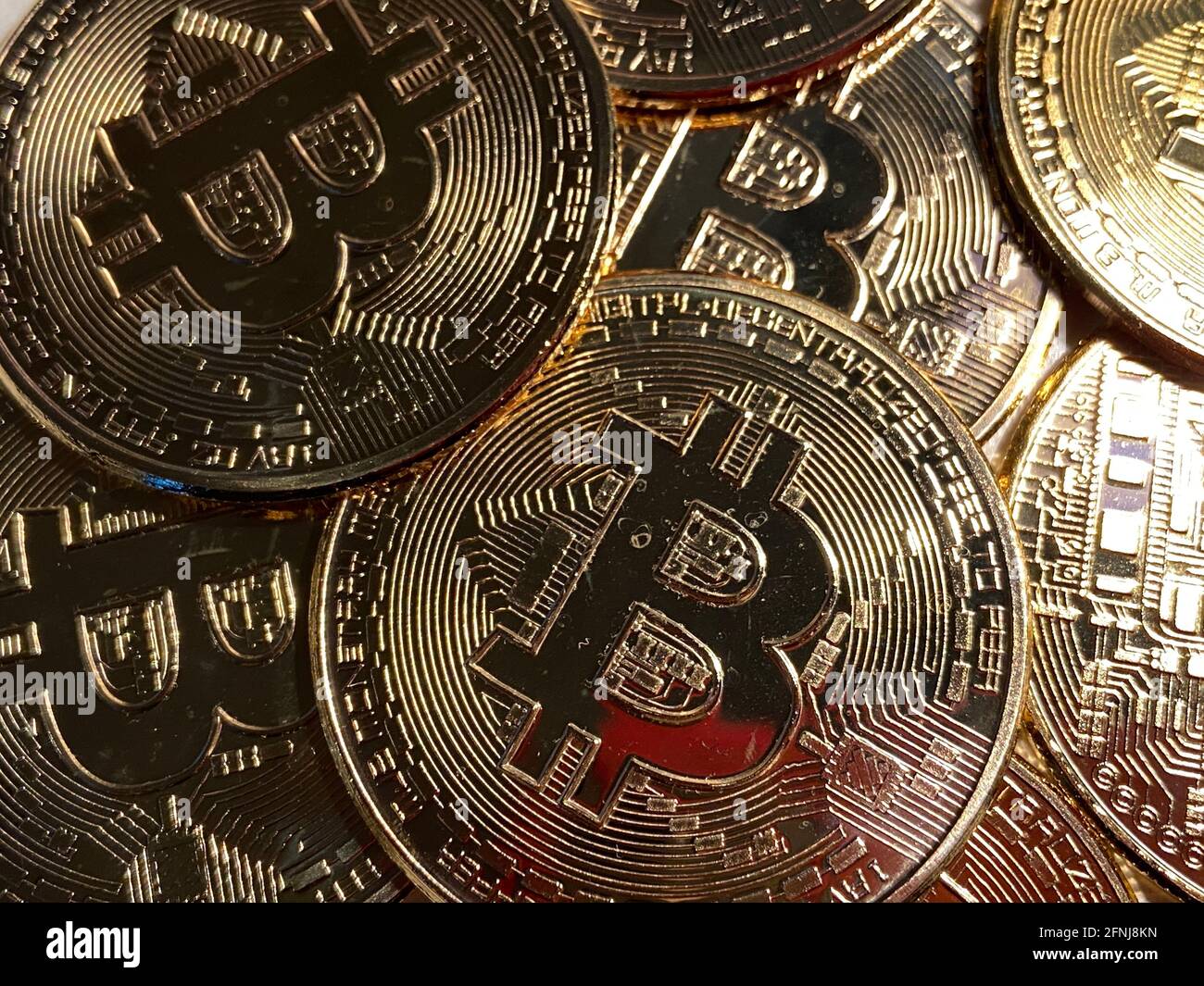 Golden bitcoin background, bitcoin is most popular crypto currency with ...