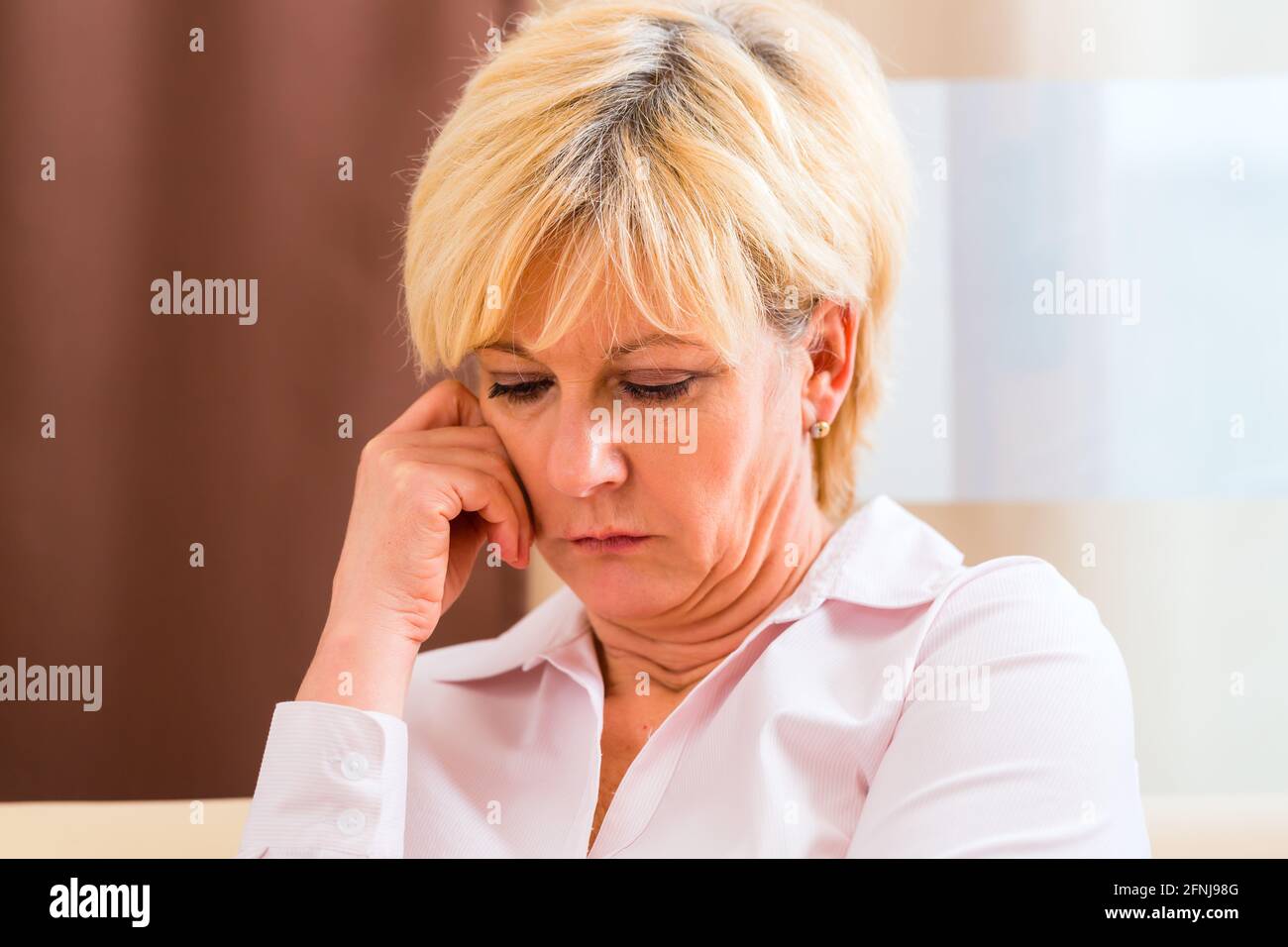 Hand touching forehead hi-res stock photography and images - Alamy