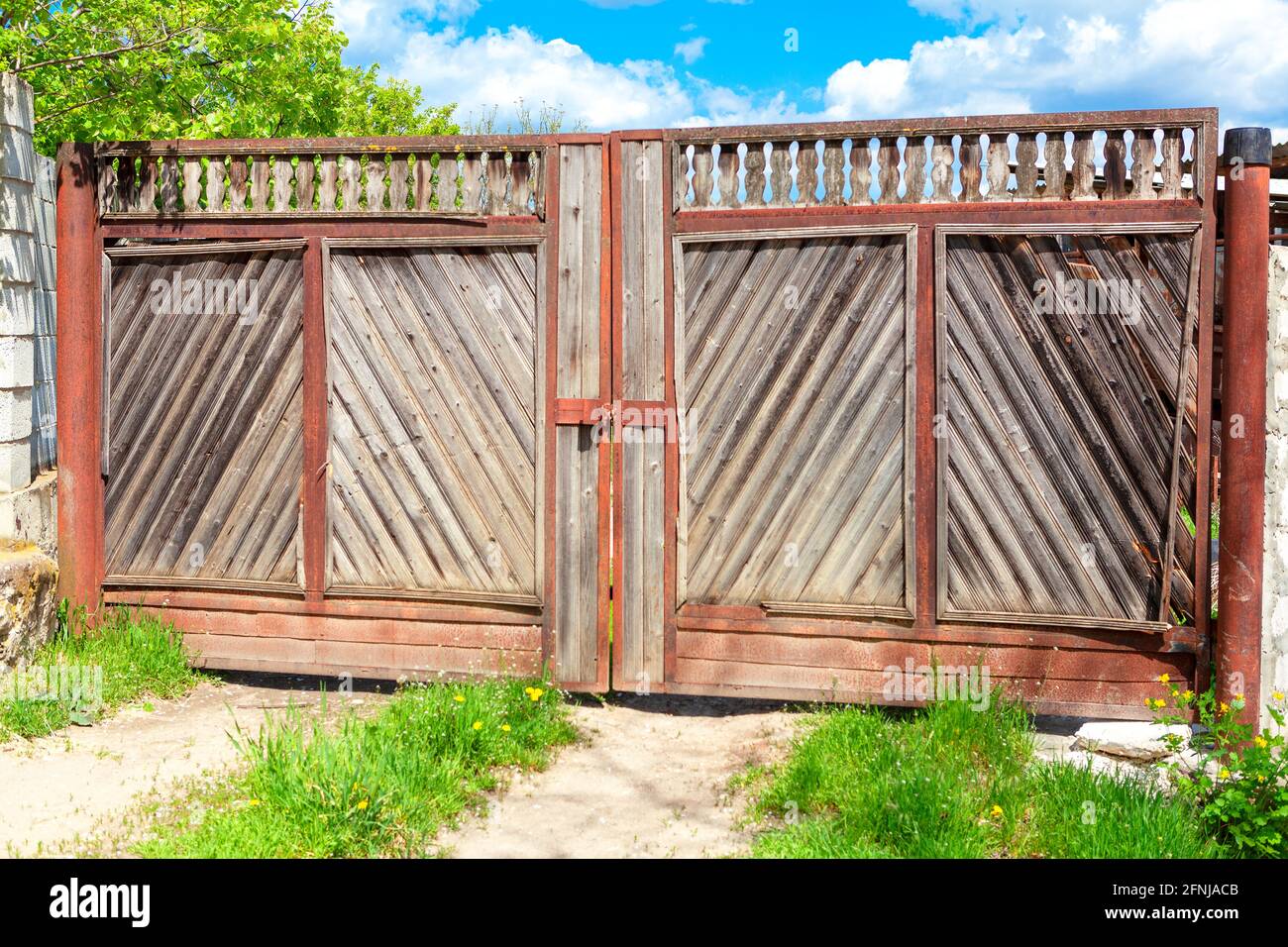 Wooden gate in village . Entrance in the rustic yard Stock Photo - Alamy
