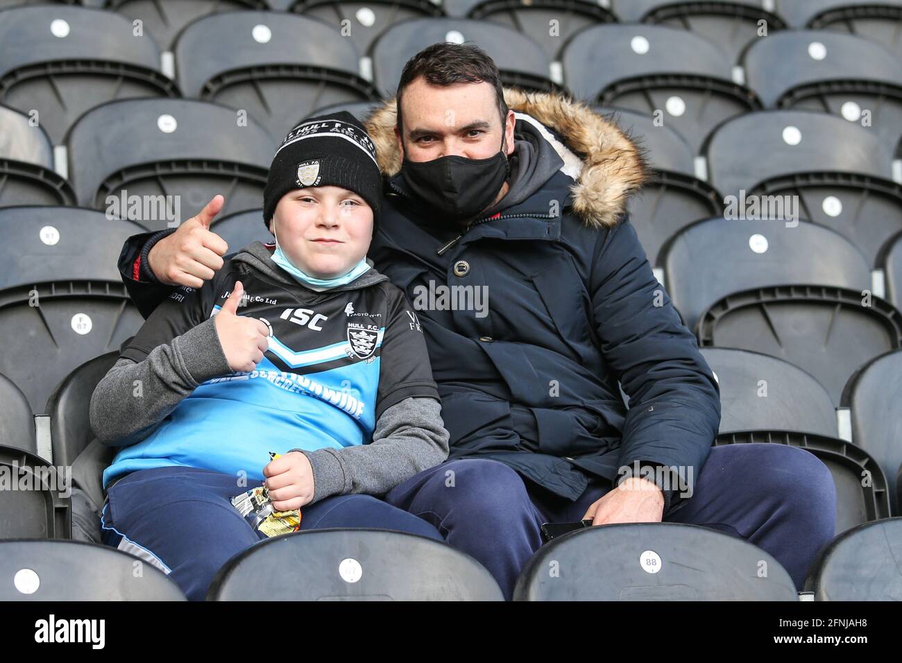 2 happy Hull FC fans give the thumbs up and wait eagerly for Hull FC to ...