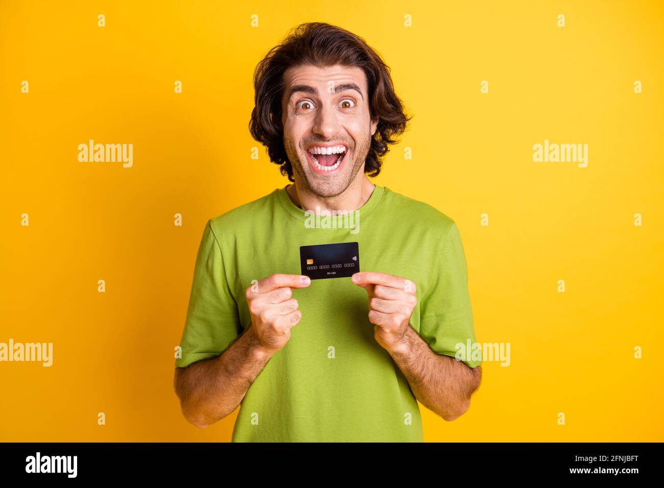 Portrait photo of happy man showing bank plastic card smiling isolated ...