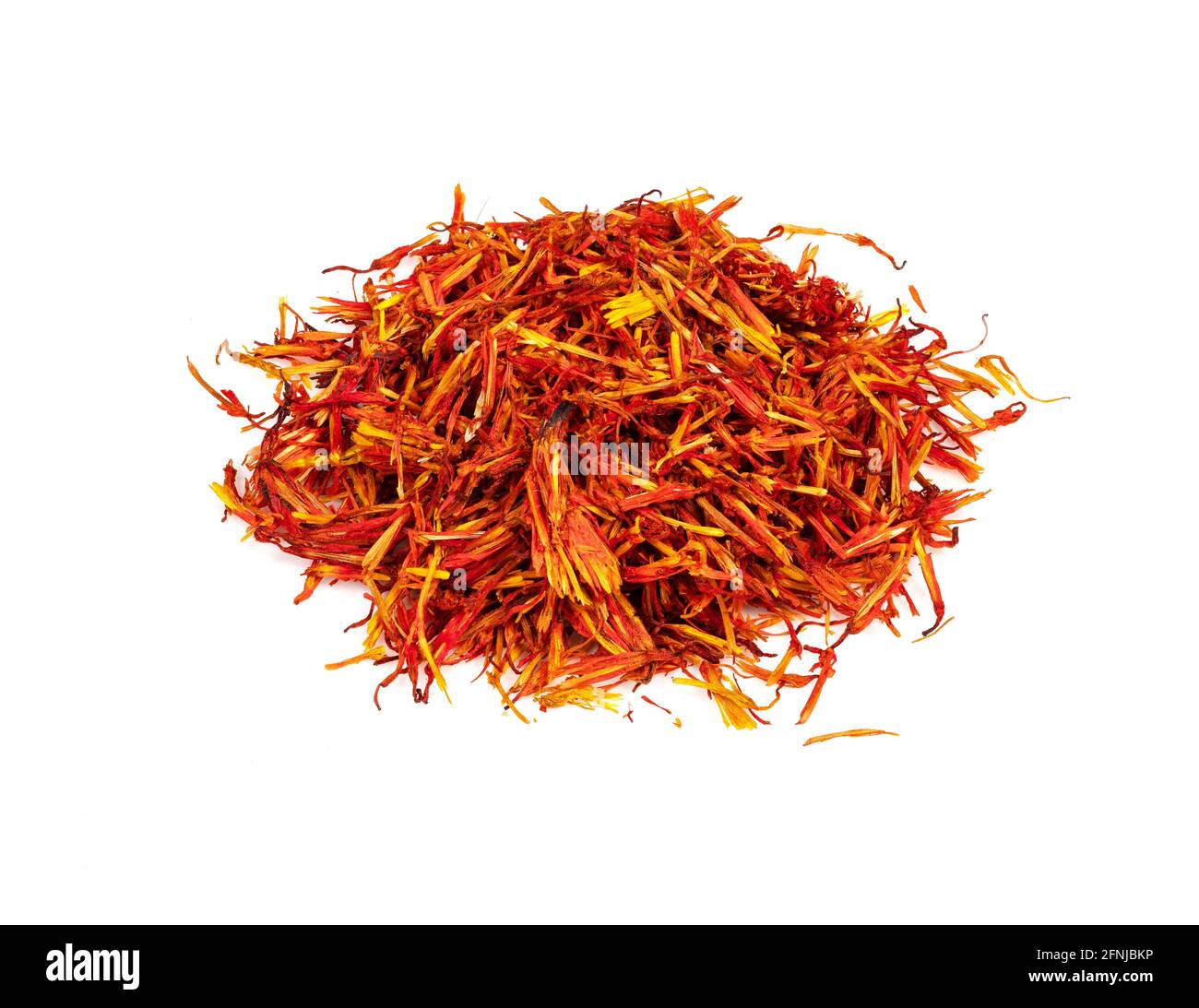 pile of dried safflower petals closeup on white background Stock Photo ...