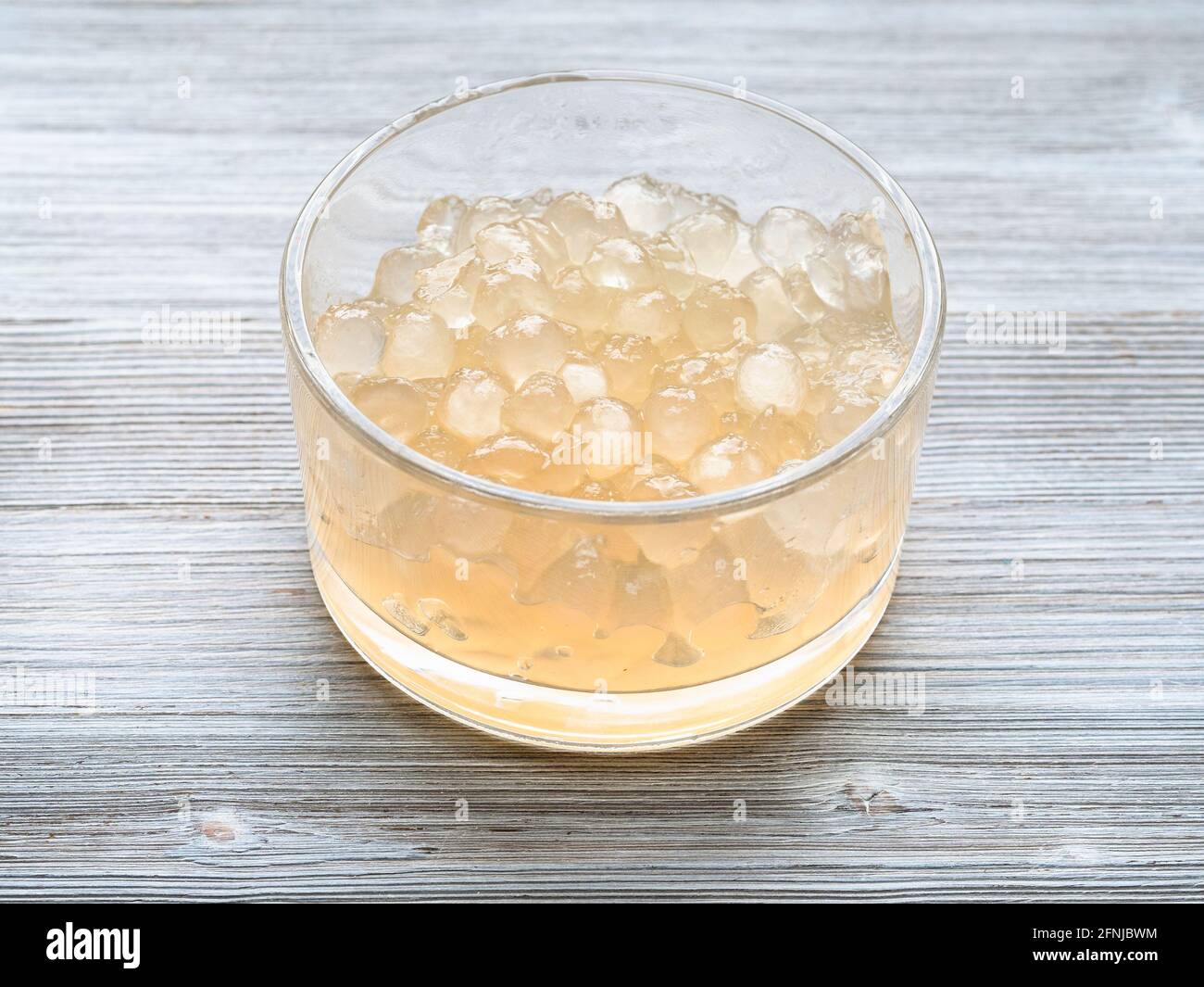 boiled tapioca bubbles in glass bowl on gray wooden table Stock Photo ...