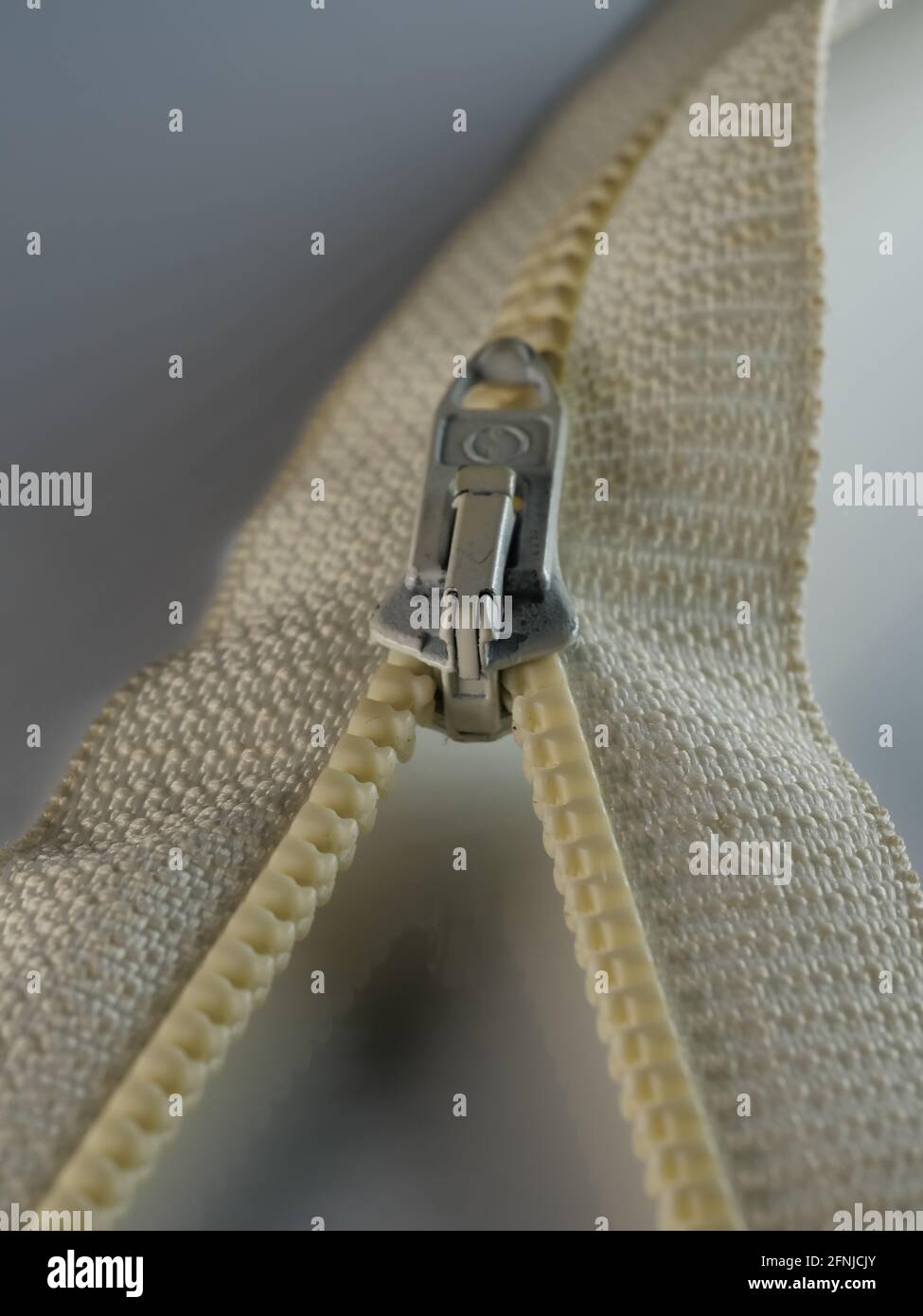 Vertical shot of a zipper of a cloth Stock Photo - Alamy