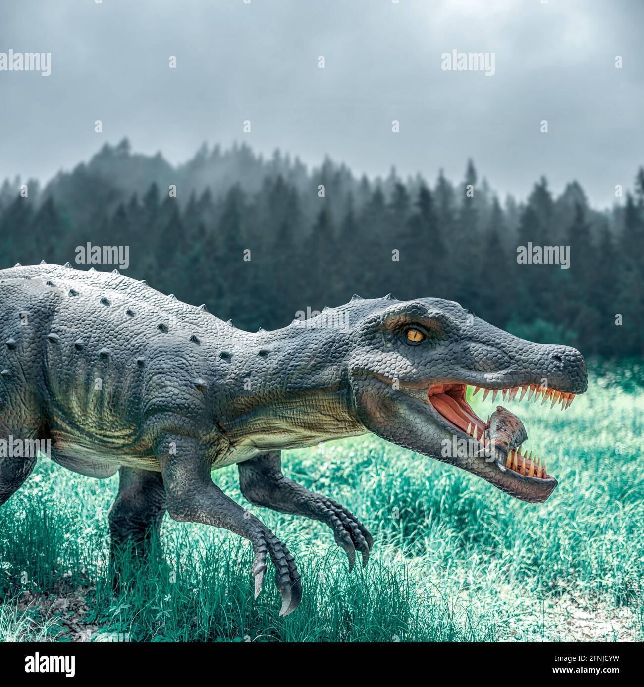 Dinosaur in the jungle Stock Photo - Alamy