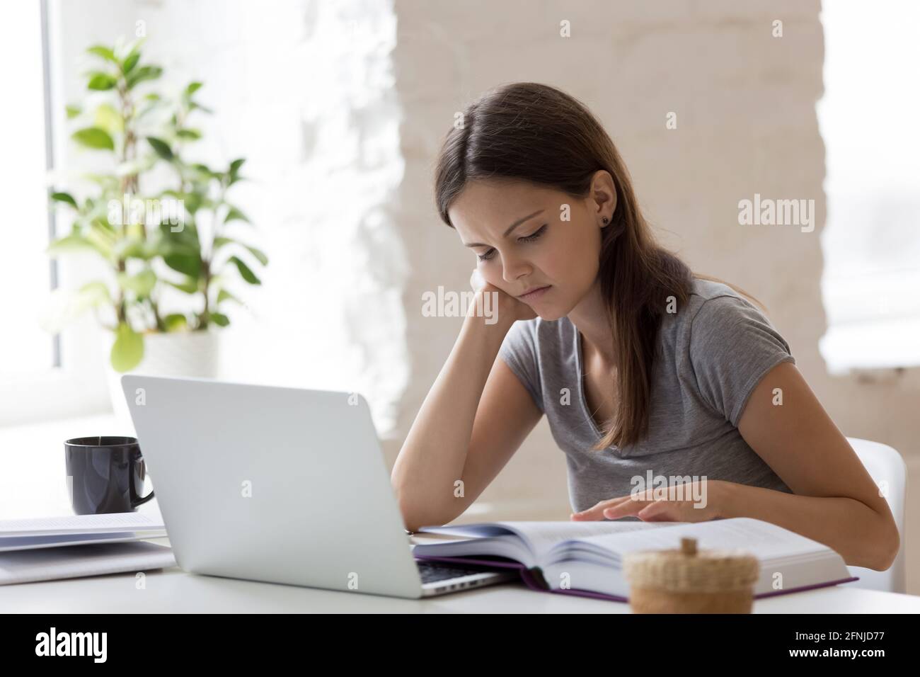 Unhappy teenager laptop hi-res stock photography and images - Alamy